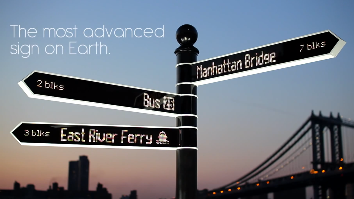 Points: A futuristic, rotating street sign with real-time social data
